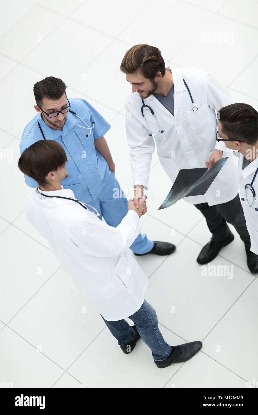 handshake two doctors at the meeting Stock Photo - Alamy