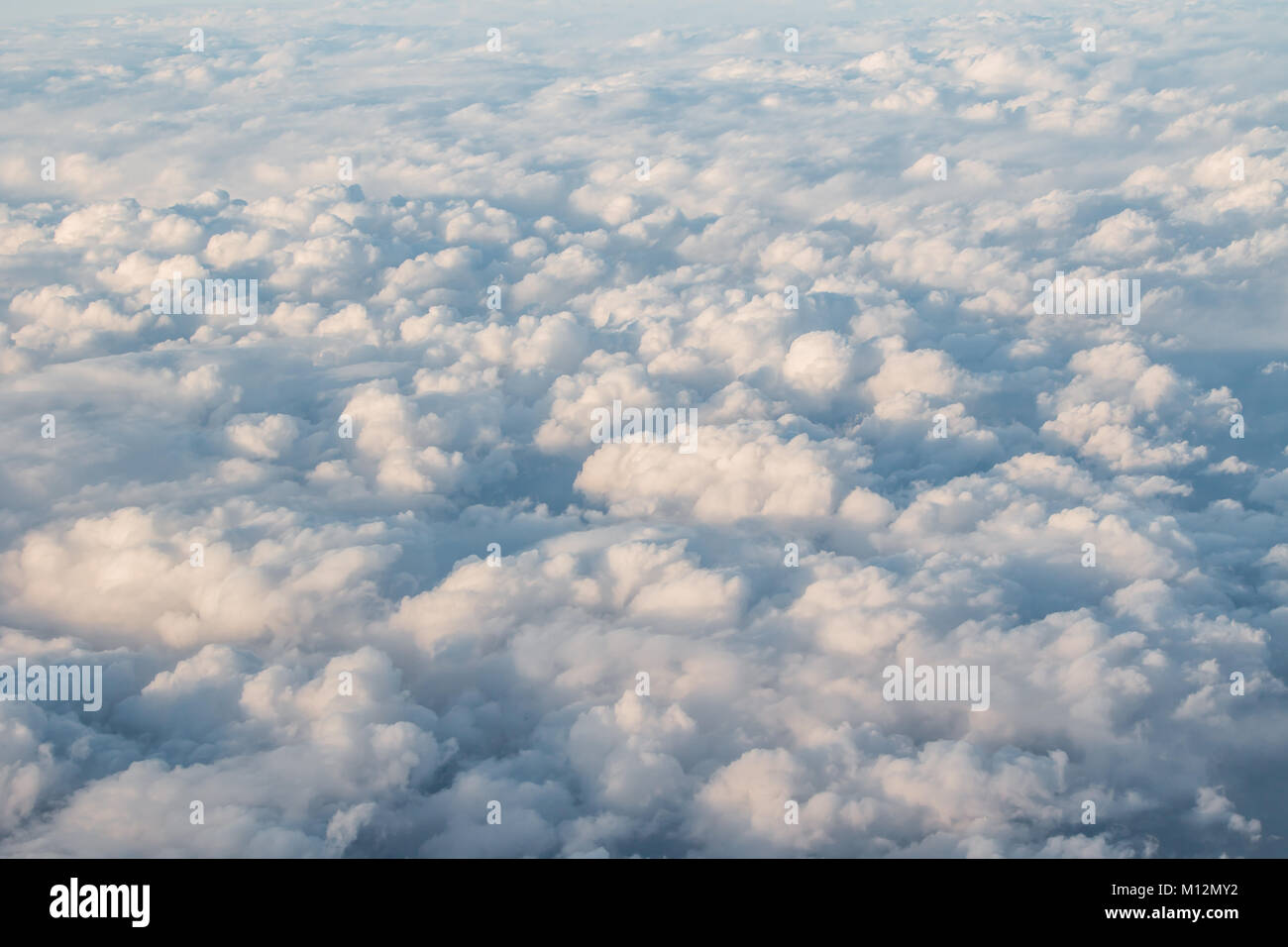 A sky full of lumpy clouds as seen from above Stock Photo - Alamy