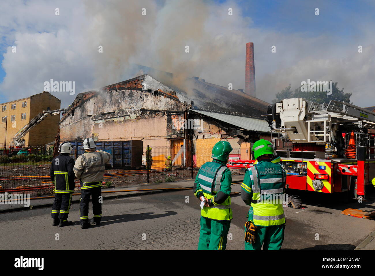 Fireman In Action Stock Photo - Alamy