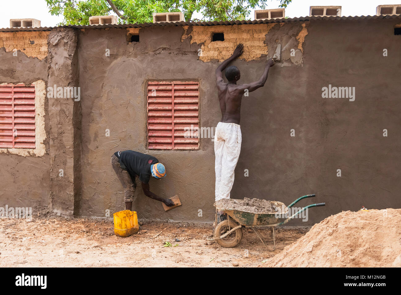 Plastering wall african hi-res stock photography and images - Alamy