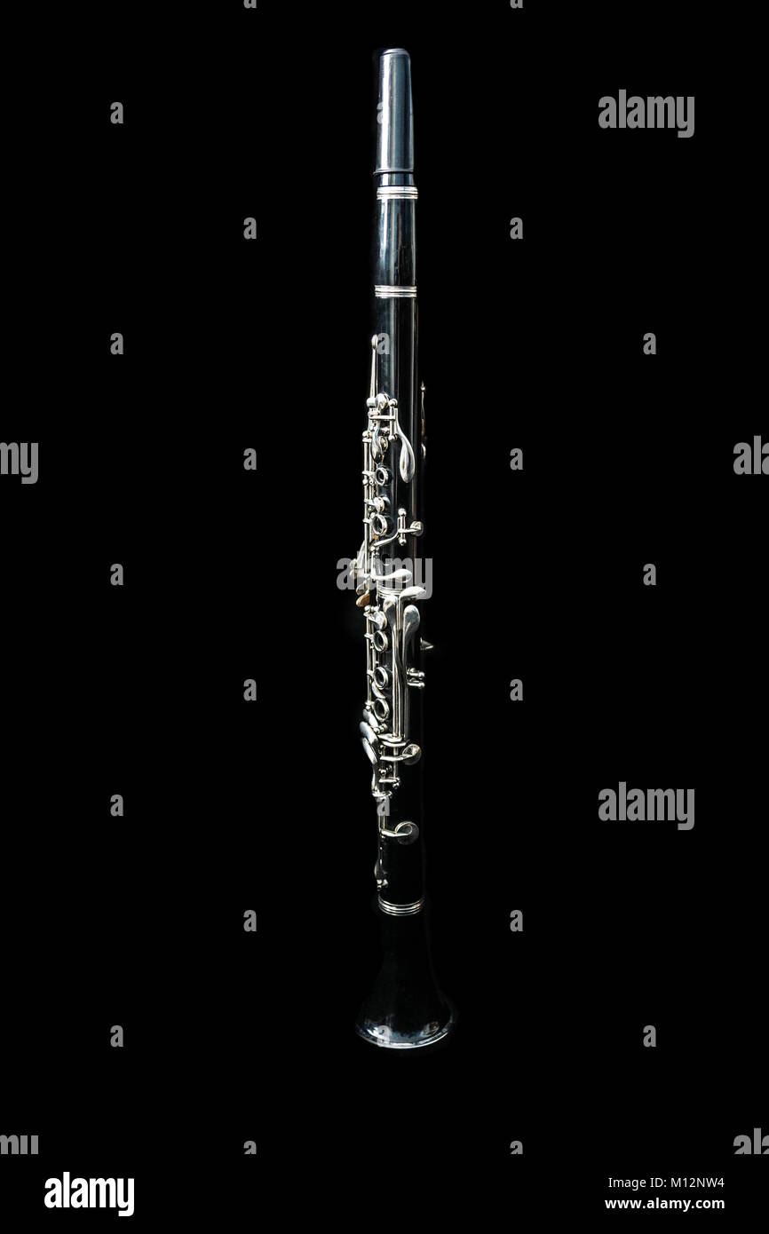 Full view of a clarinet standing isolated in black Stock Photo - Alamy