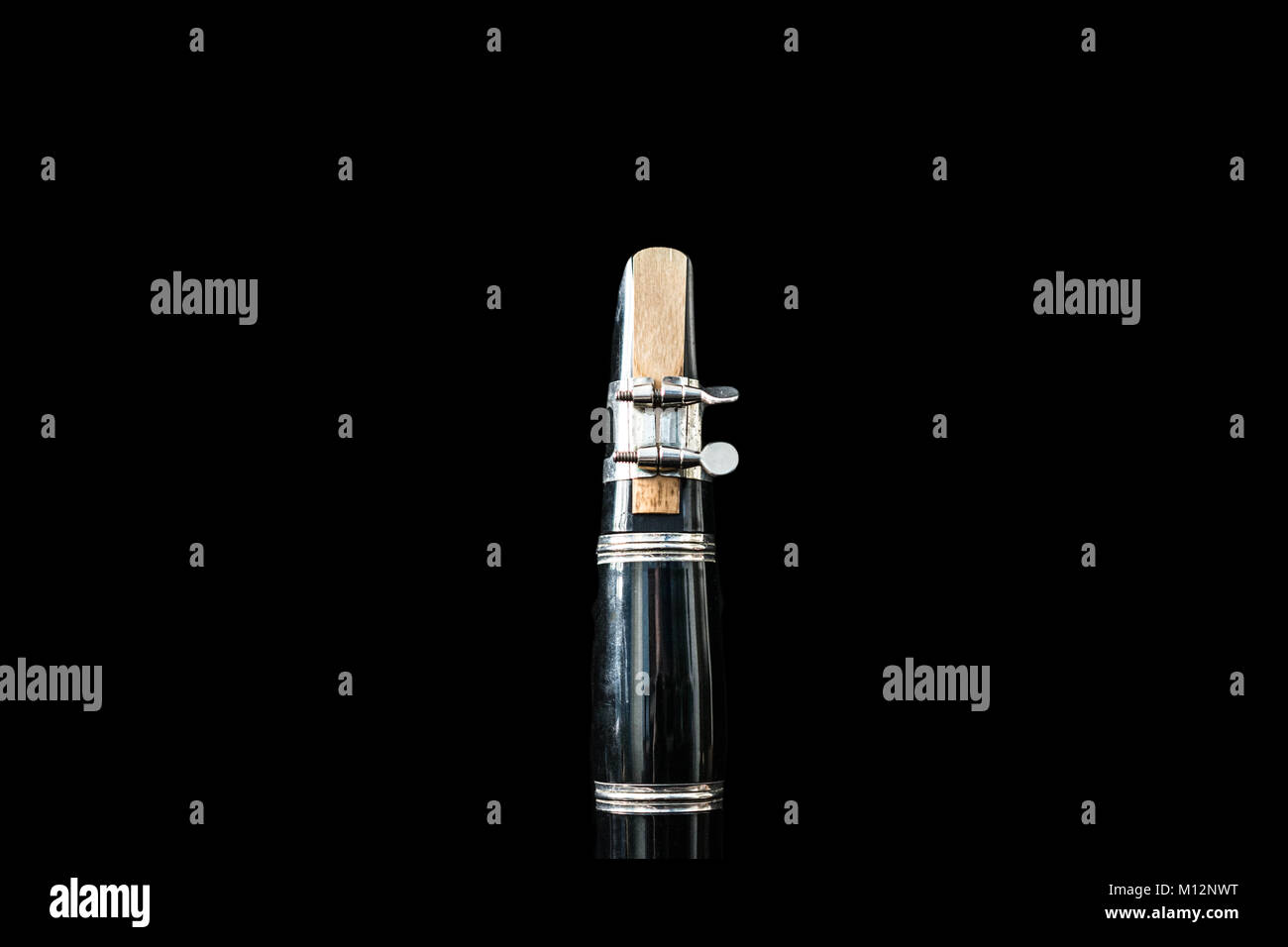 Close up of a clarinet standing isolated in black Stock Photo - Alamy