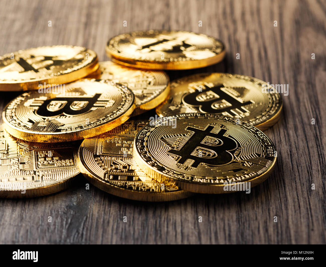 bitcoin coin model on wooden board Stock Photo - Alamy