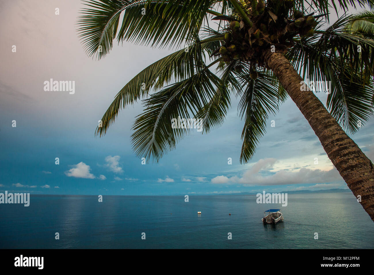 Clouds move in over Royal Davui Island in the Fiji Islands Stock Photo ...
