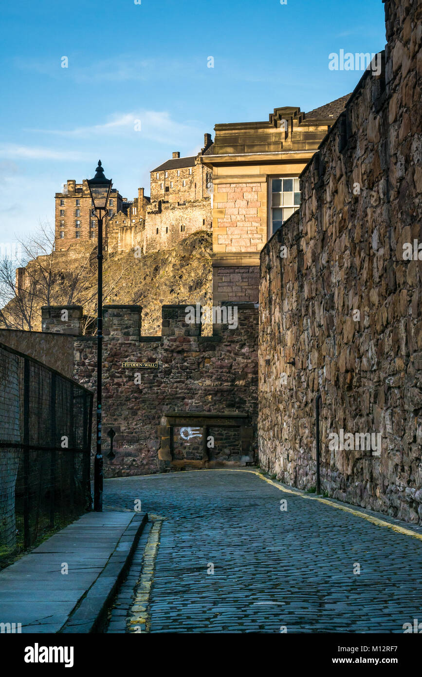 Flodden wall and Vennel alley with Edinburgh Castle rocky outcrop lit ...