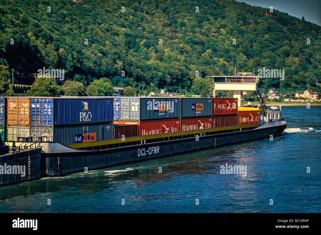 European river cruise and commercial barges Stock Photo - Alamy