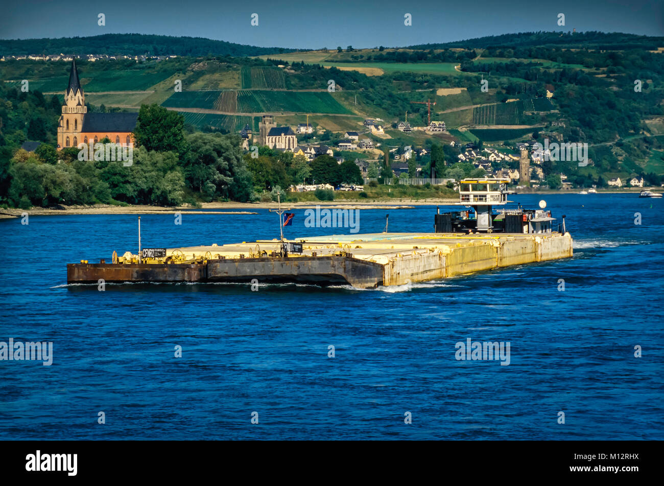 European river cruise and commercial barges Stock Photo - Alamy