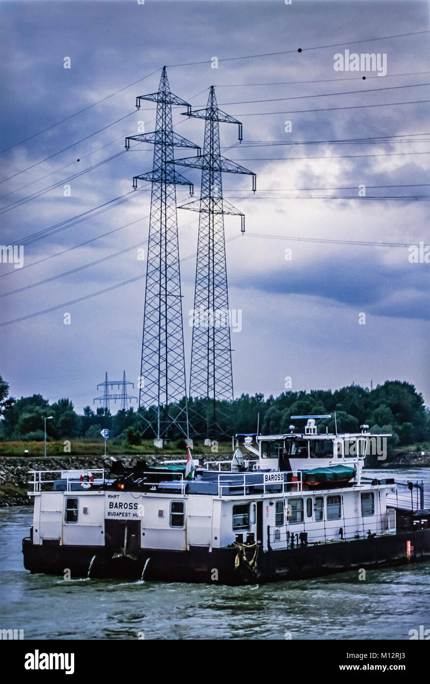 European river cruise and commercial barges Stock Photo - Alamy
