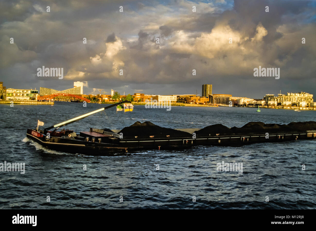 European river cruise and commercial barges Stock Photo - Alamy