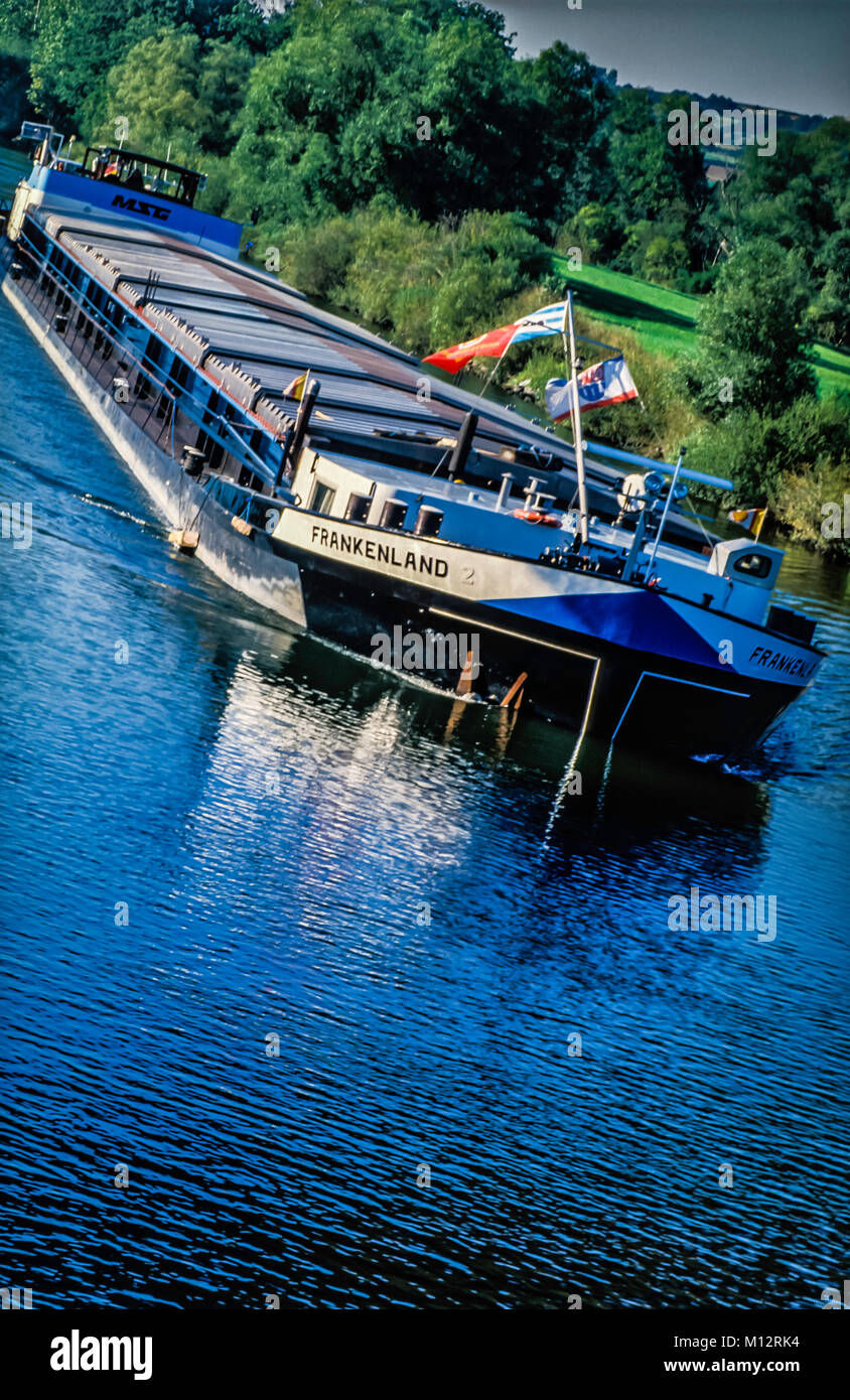 European river cruise and commercial barges Stock Photo - Alamy