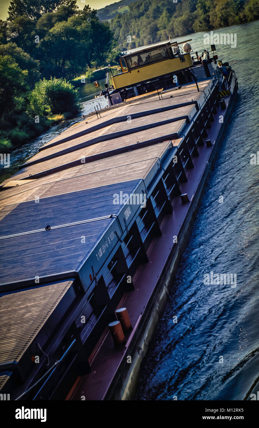 European river cruise and commercial barges Stock Photo - Alamy