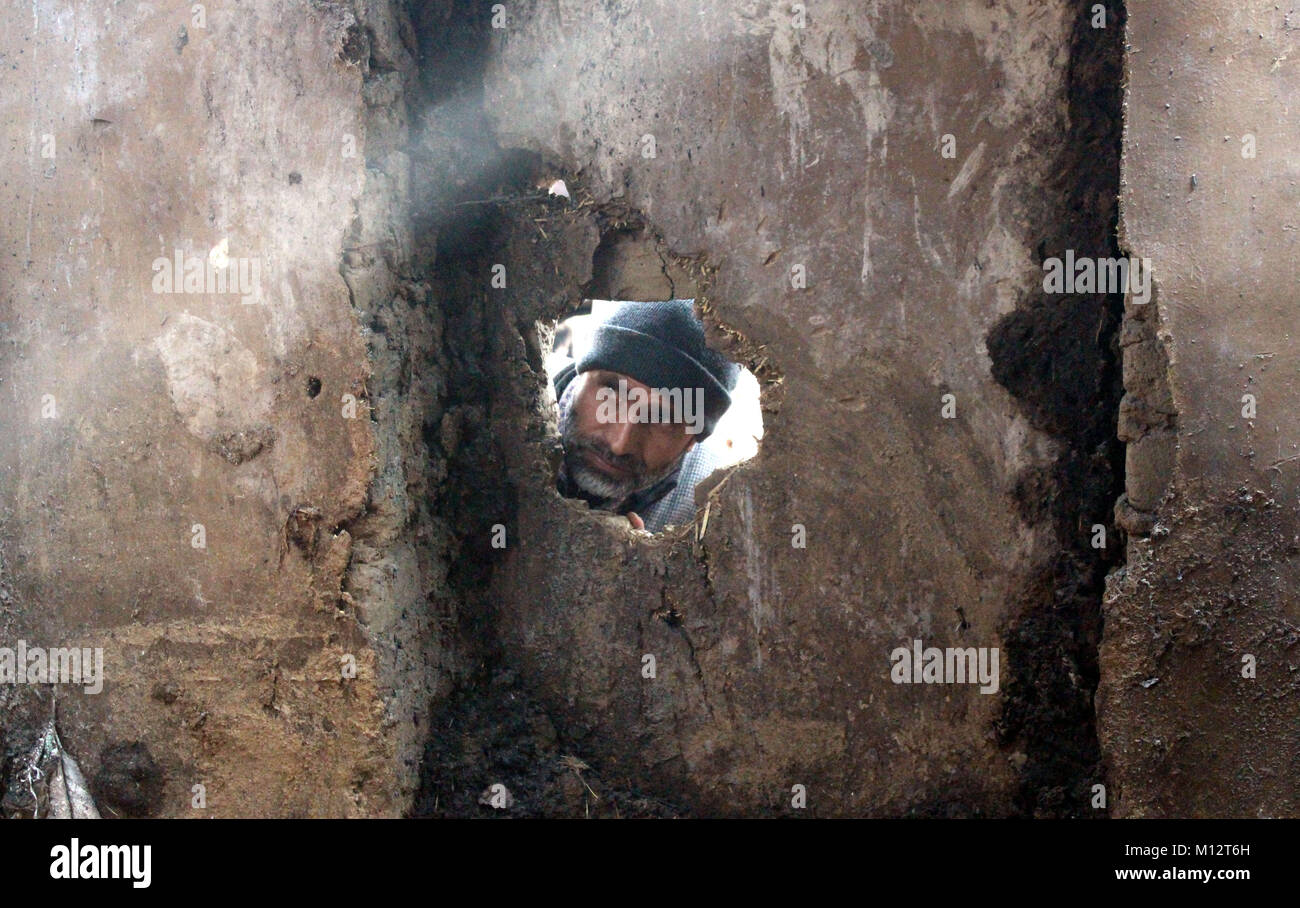 Shopain, India. 24th Jan, 2018. Kashmiri Muslim visits encounter site where Sameer ah Wani was ...
