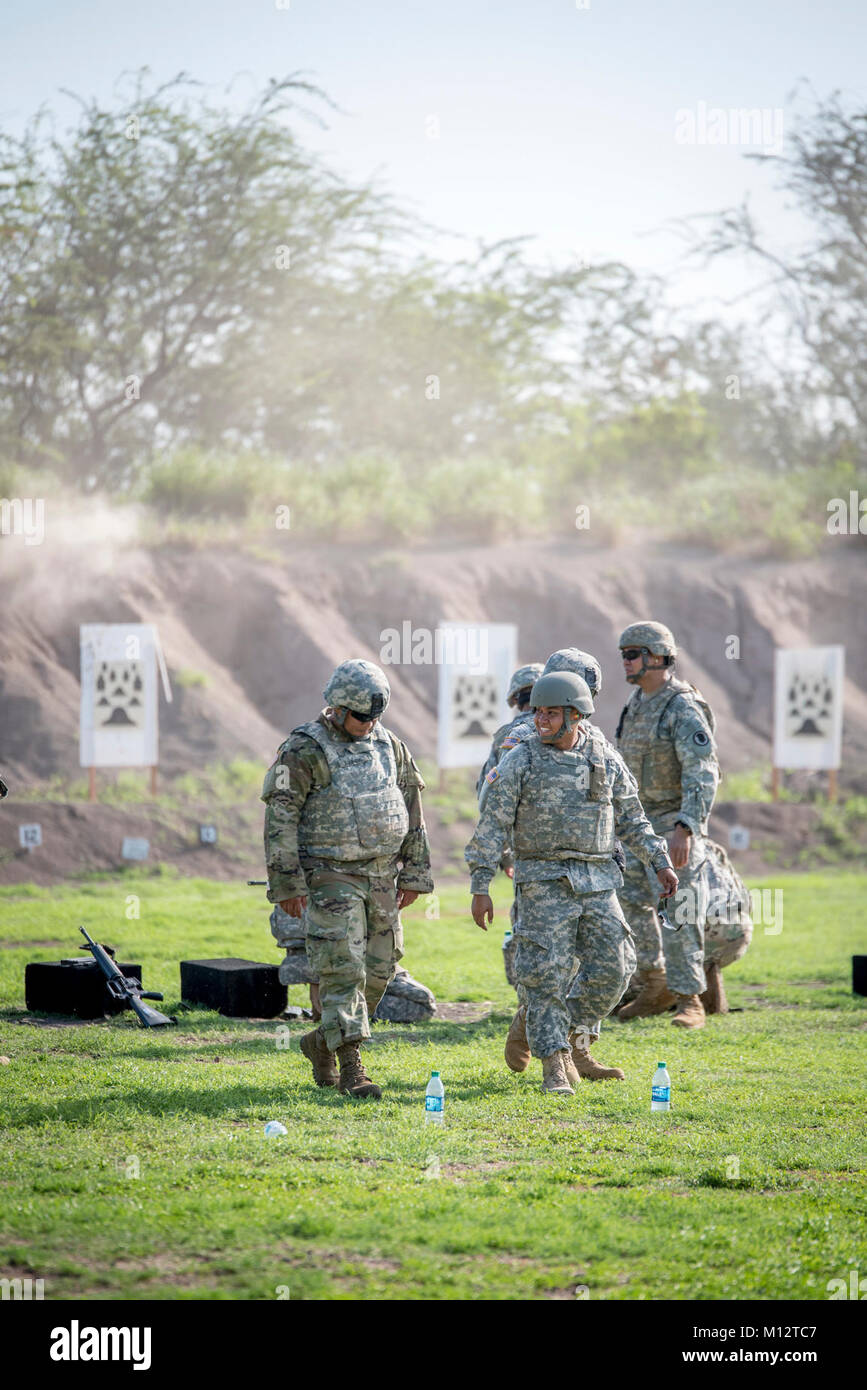 Soldiers of the 103rd Troop Command smile after they qualify at the ...