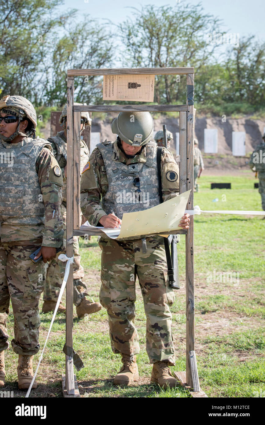 A Soldier of the 103rd Troop Command assesses his target at the range ...