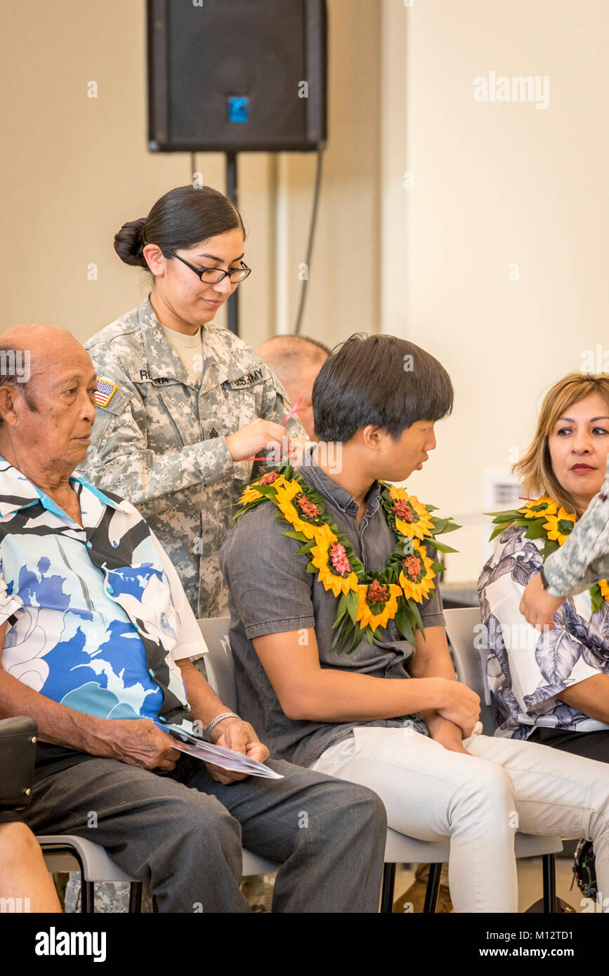 A lei is presented during the Hawaii Army National Guard change of ...