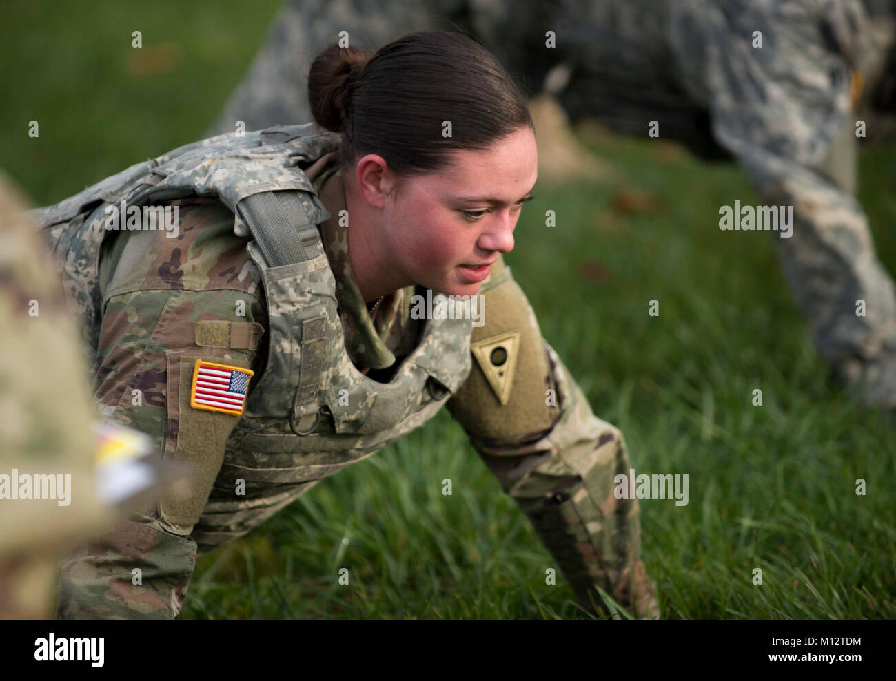 Soldiers conduct a modified Army Physical Fitness Test during the ...