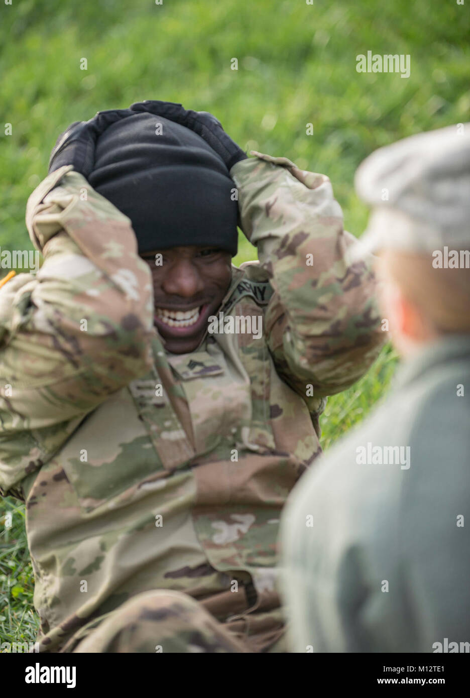 Soldiers conduct a modified Army Physical Fitness Test during the ...
