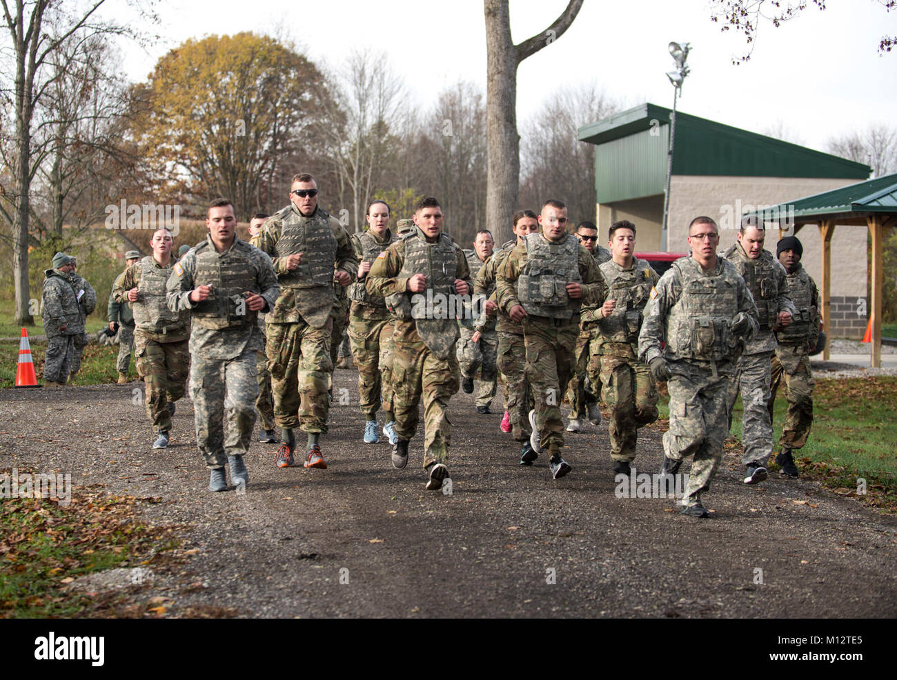 Soldiers conduct a modified Army Physical Fitness Test during the ...