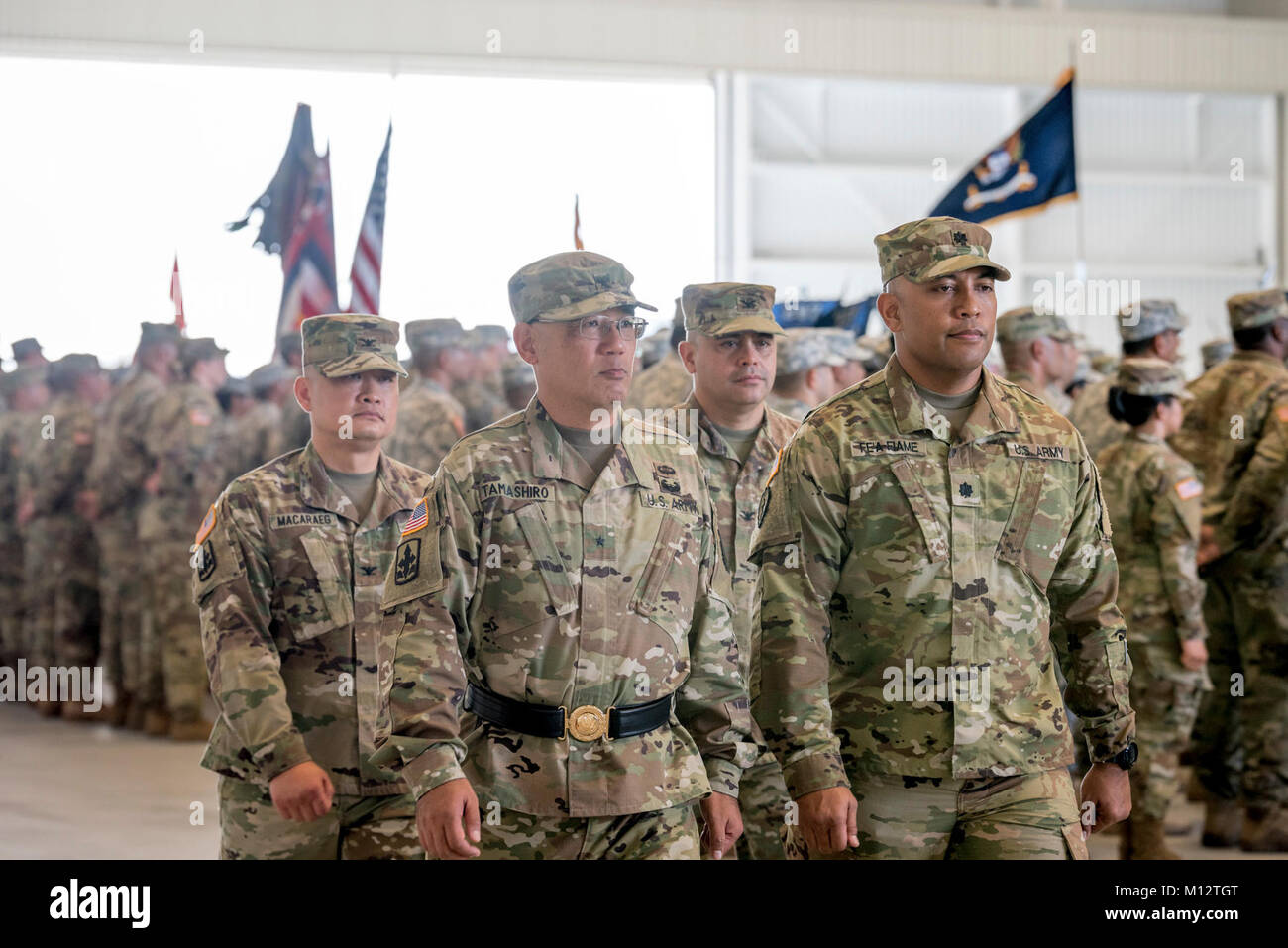 The official party conducts an inspection of the command during the ...
