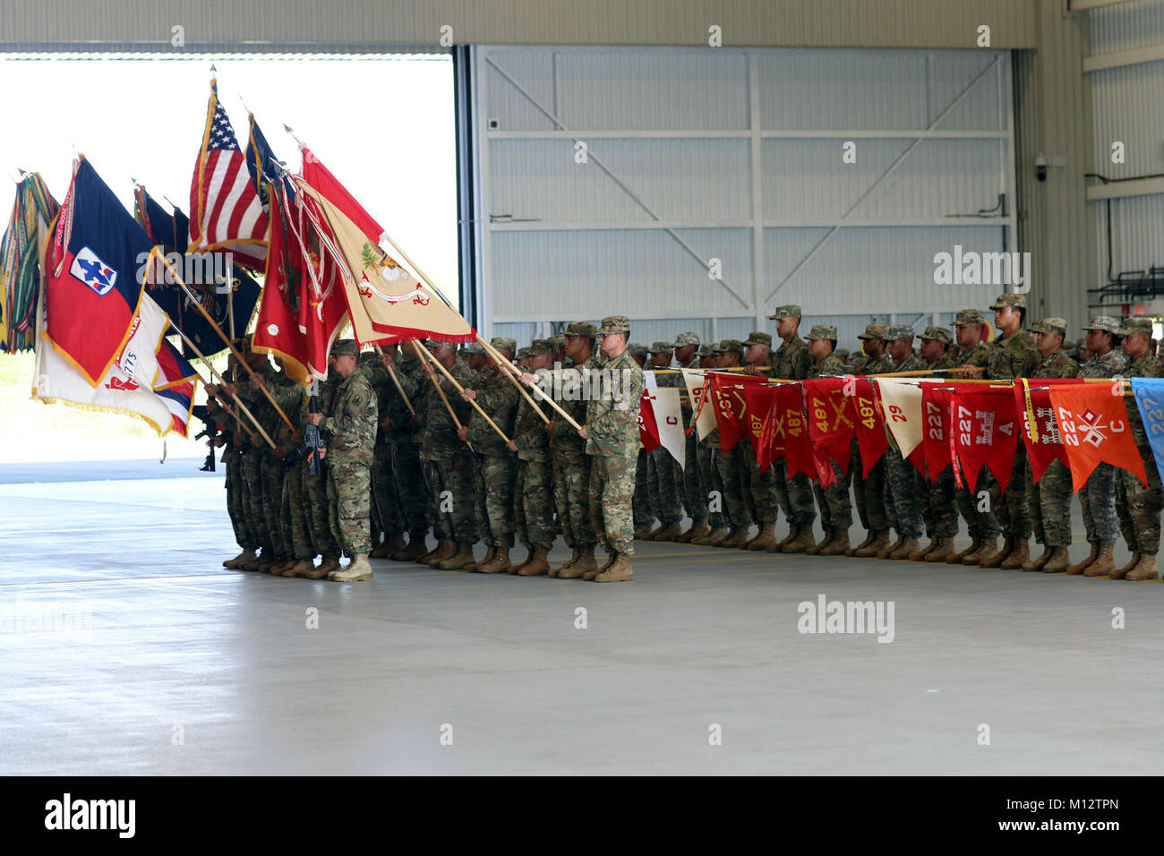 Soldiers of the 29th Infantry Brigade Combat Team stand in formation ...