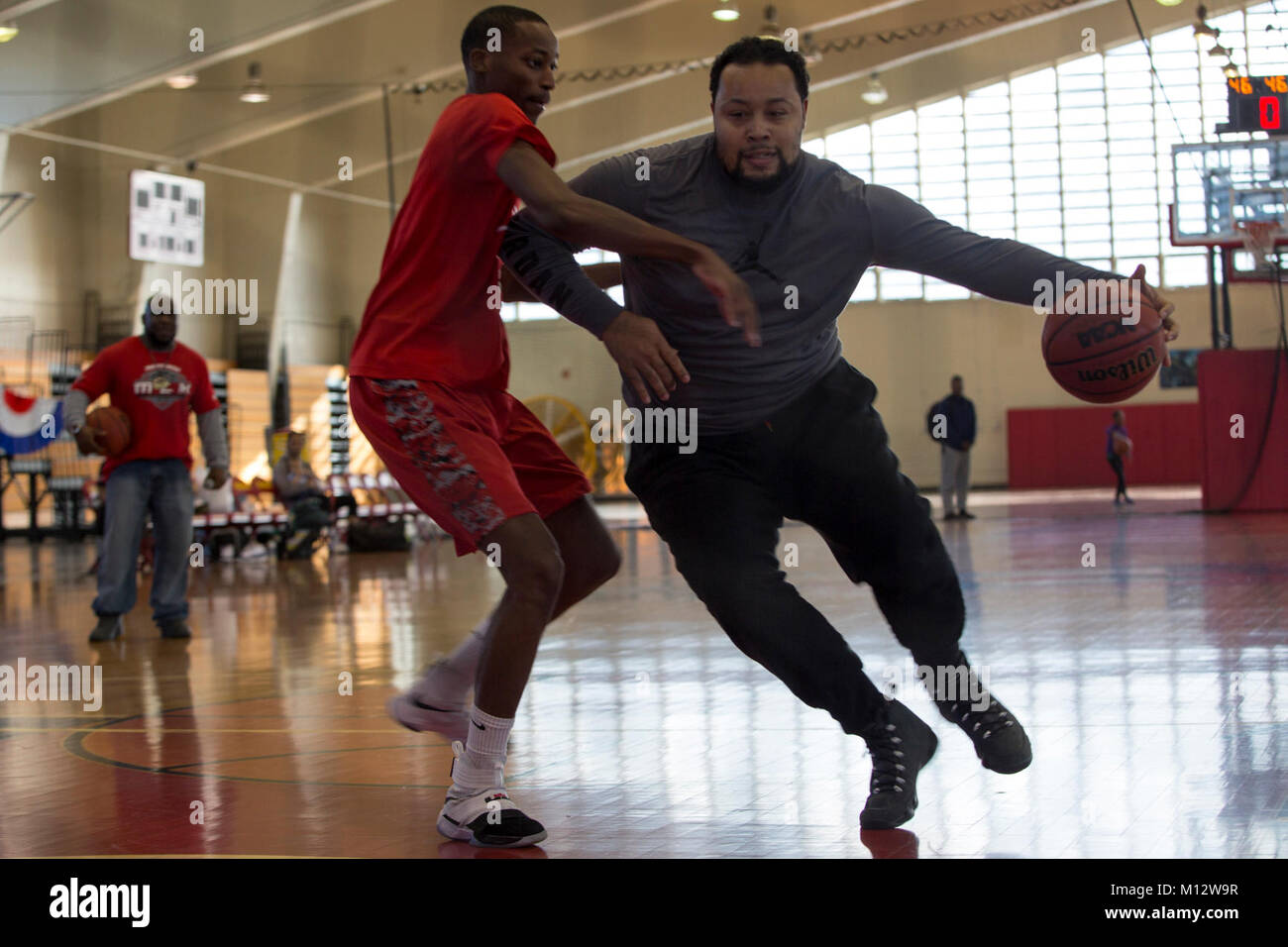 CAMP FOSTER, OKINAWA, Japan- Terrence Terrell shuffles around the ...