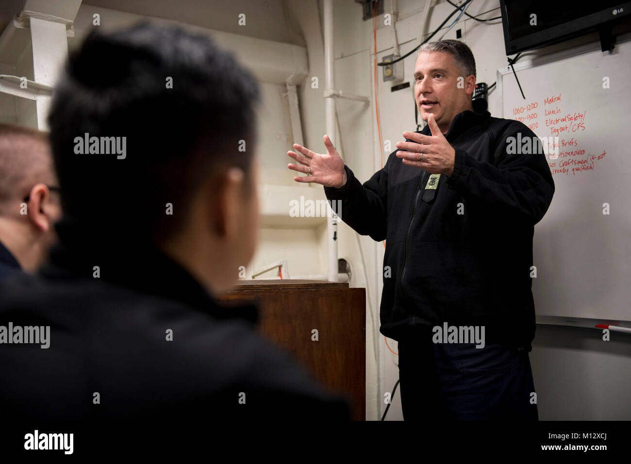 BAY OF CADIZ (Jan. 20, 2018) Command Master Chief Richard James speaks ...