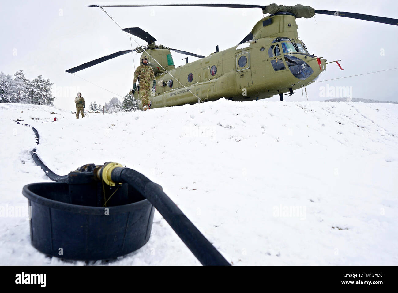 Sgt. Shane Outlaw (left) and Staff Sgt. Anquan Bagley (right), CH-47 ...