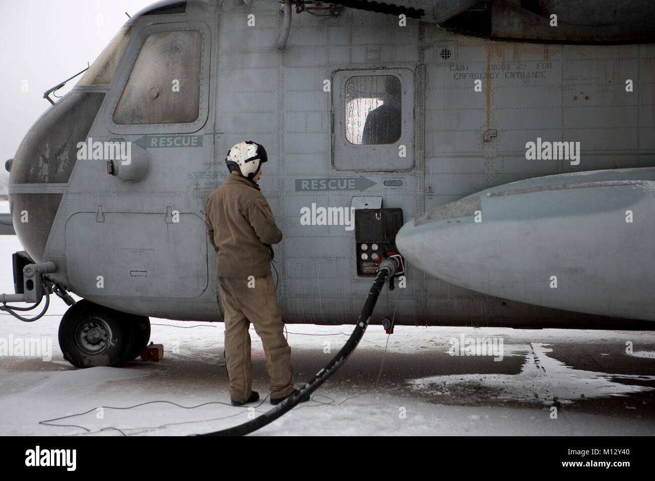 U.S. Marine Lance Cpl. Zane Fitzsimmons, a crew chief with Marine Heavy ...