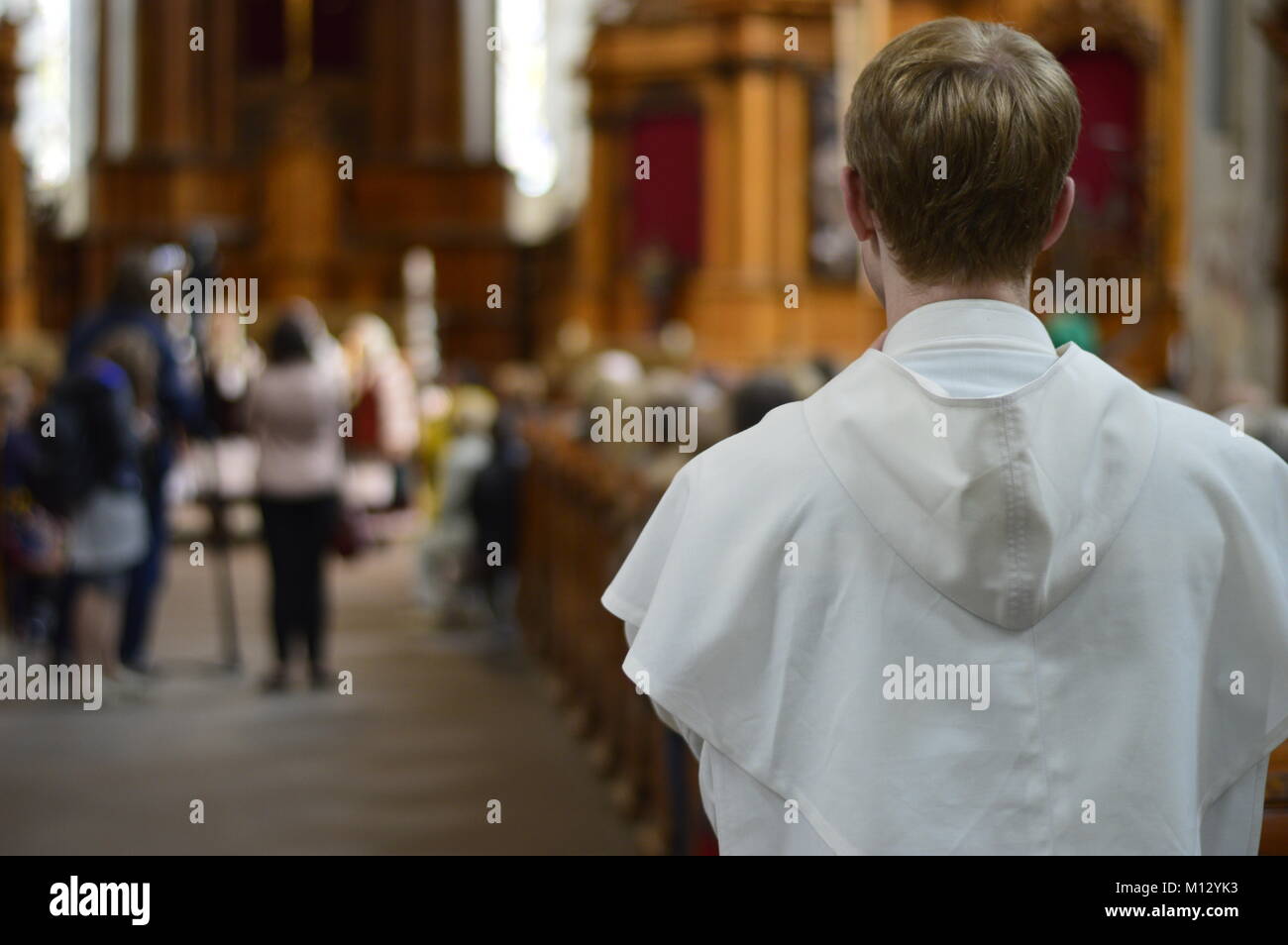 Priest in church Stock Photo - Alamy