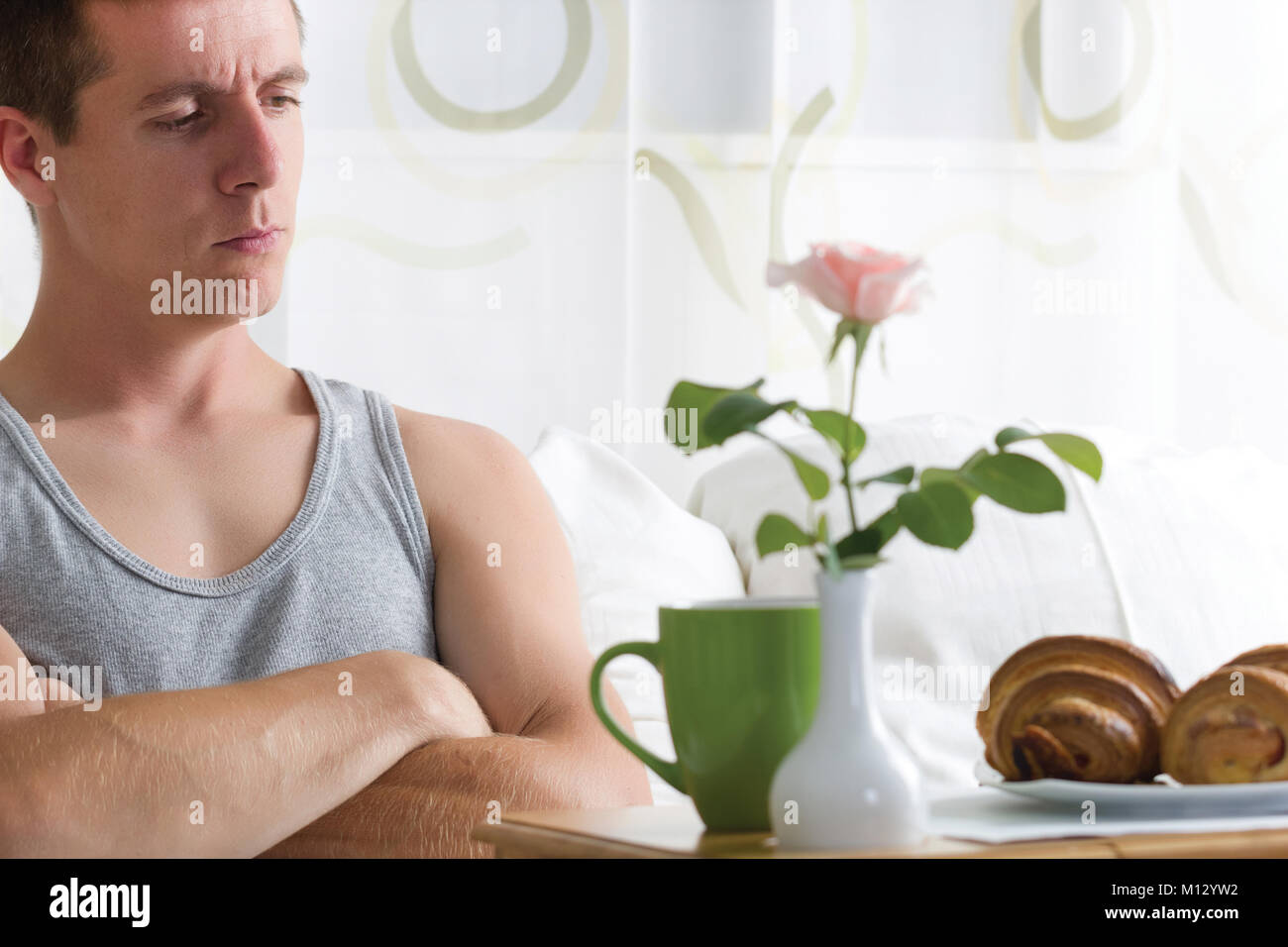 angry man in bed waiting woman for breakfast Stock Photo - Alamy