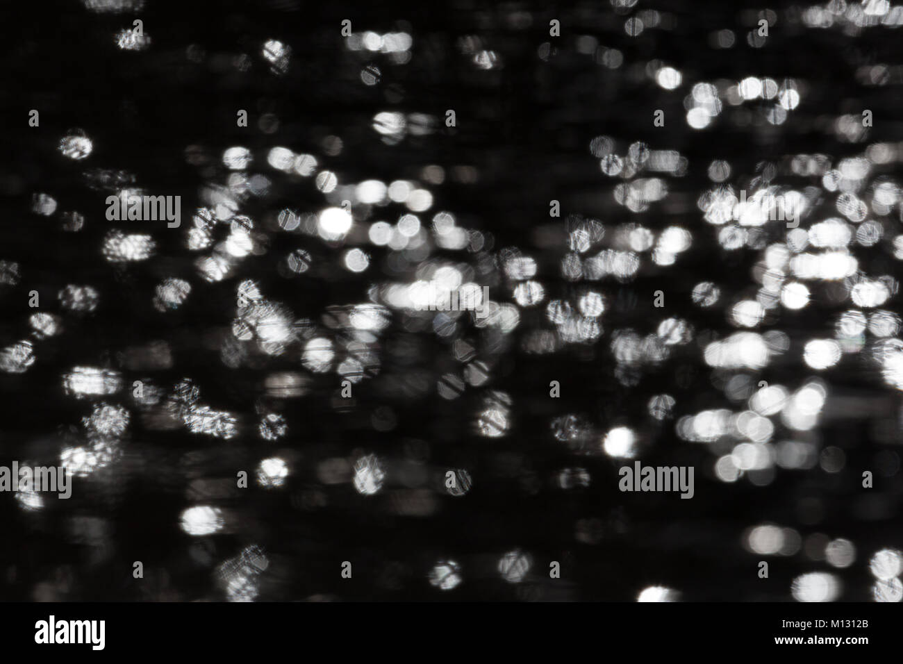 sparkling natural round flares reflections in water Stock Photo - Alamy