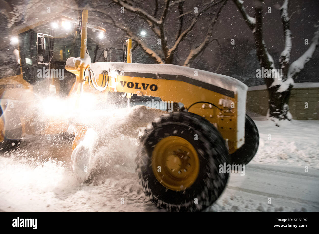 An Airman with the 374th Civil Engineer Squadron plows the bases ...
