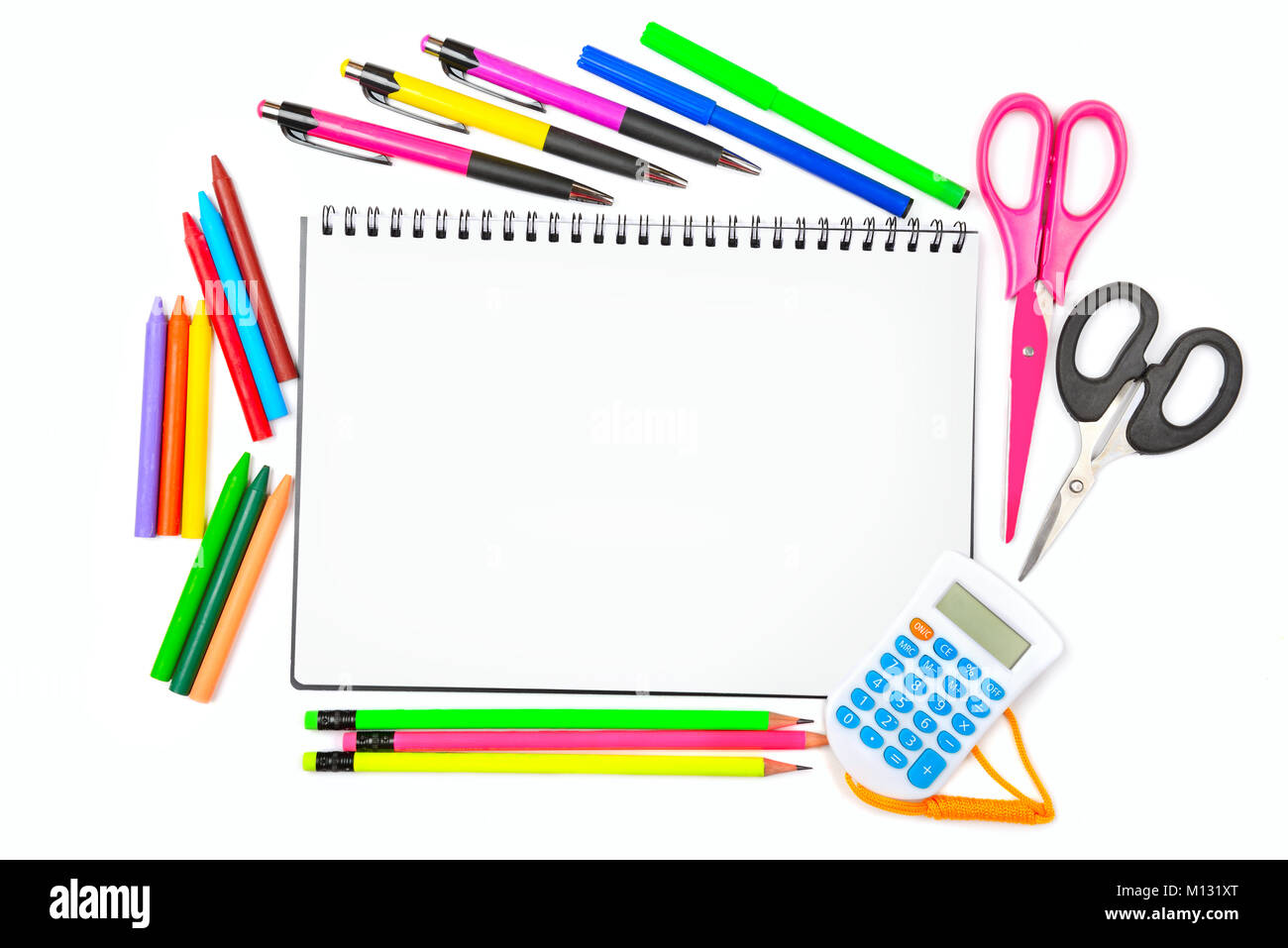 Notebook, colored pencils, crayons, markers, ballpoint pens and ...