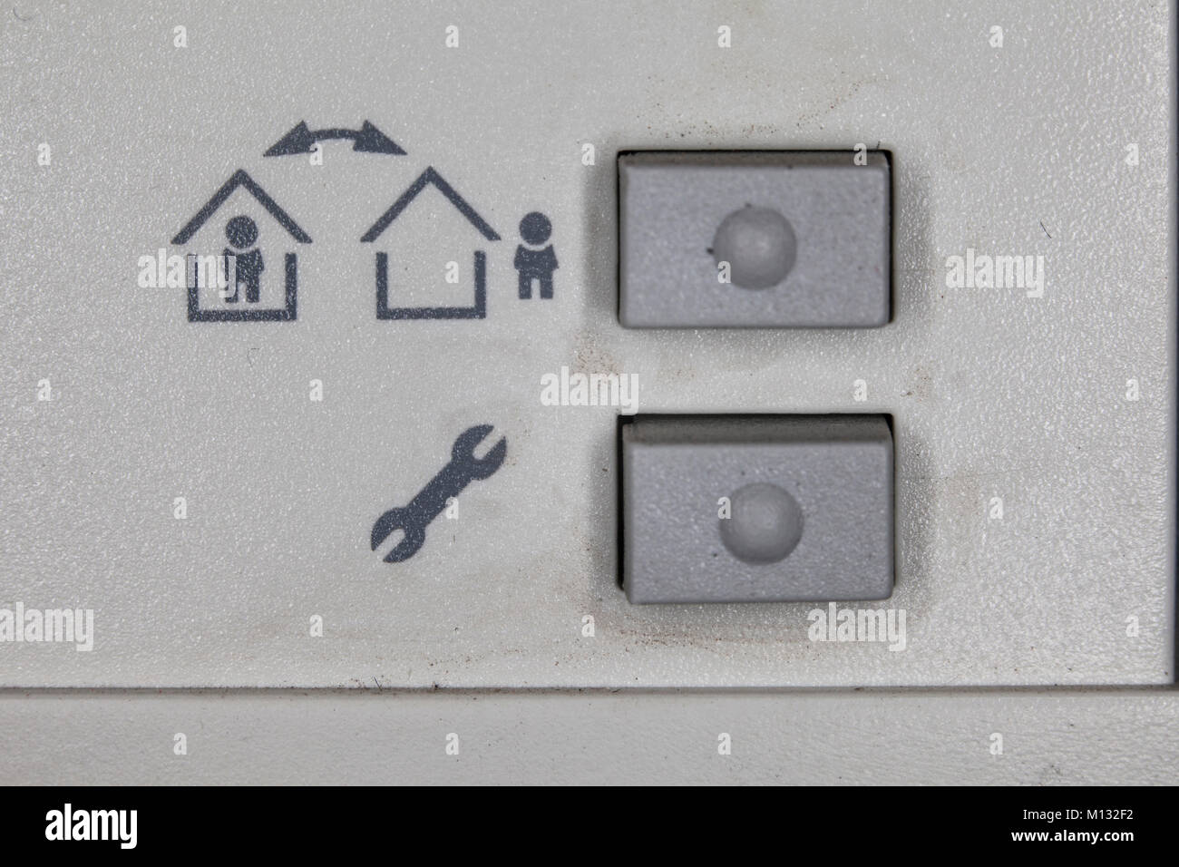 buttons on the alarm in the apartment Stock Photo - Alamy