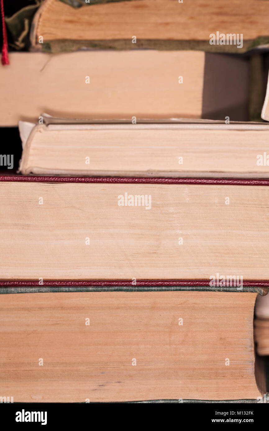 a stack of old books stacked on top of each other Stock Photo - Alamy