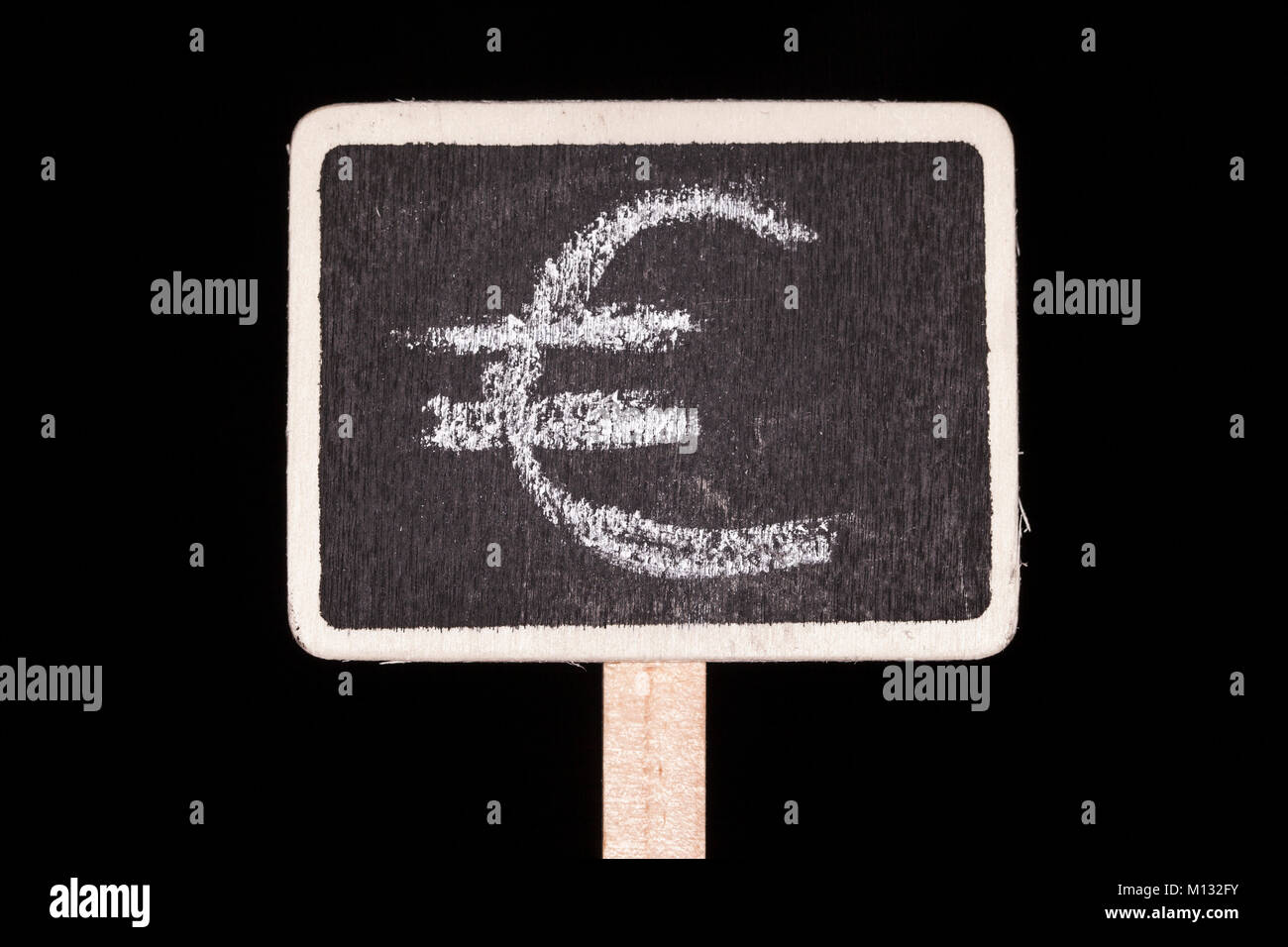 euro currency symbol on a black background Stock Photo - Alamy