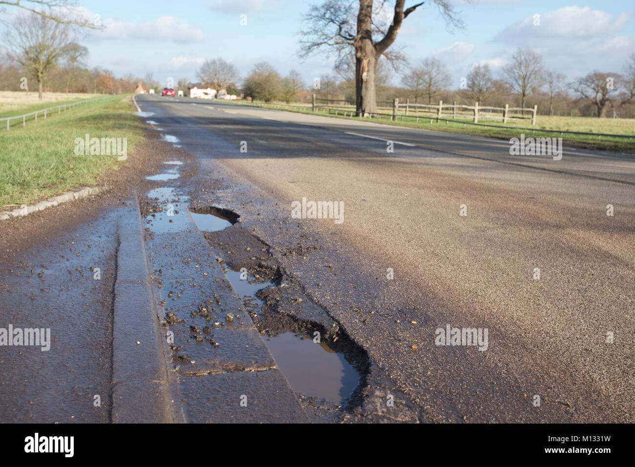 Multiple potholes in road hi-res stock photography and images - Alamy