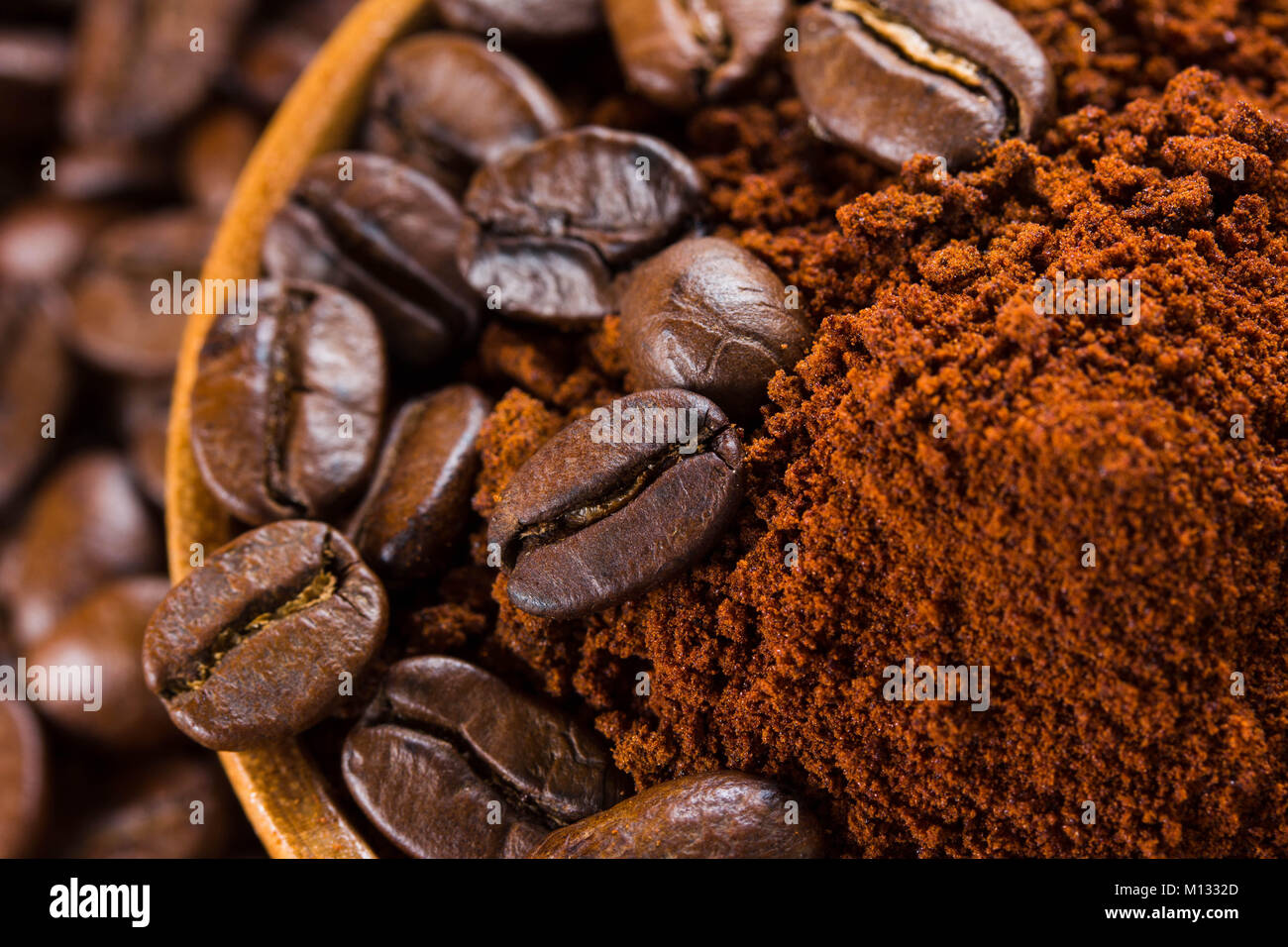 roasted brown coffee beans and powder background Stock Photo - Alamy