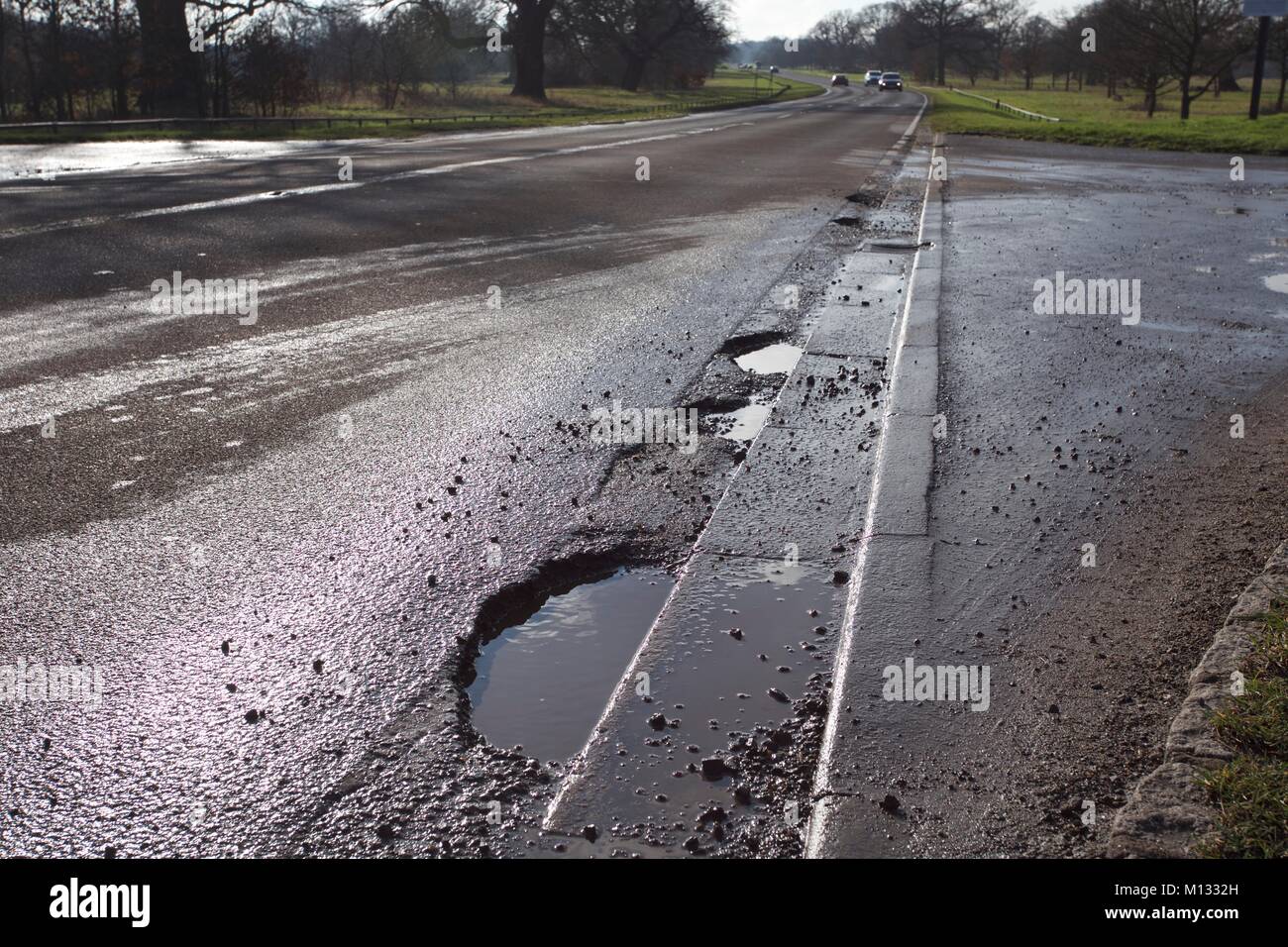 Multiple potholes in road hi-res stock photography and images - Alamy