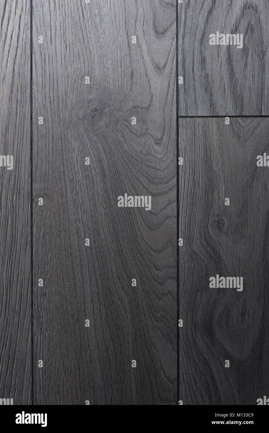 Close up black laminate floor background texture Stock Photo - Alamy