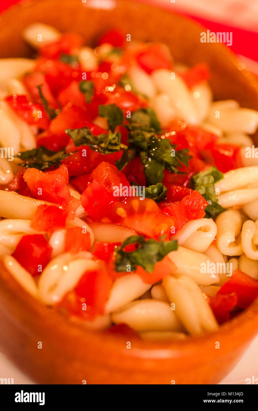 Italy Apulia Cavatelli pasta Fresh tomato and basil Stock Photo - Alamy