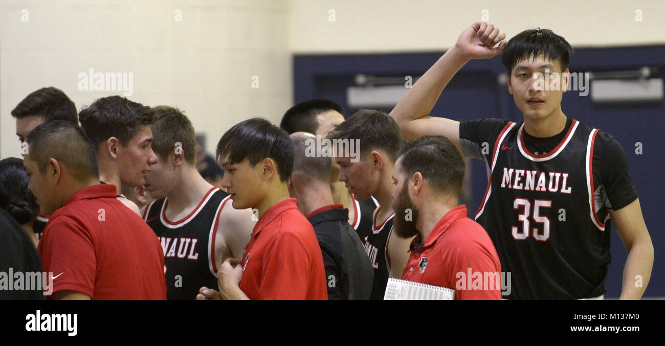 U.S. 25th Jan, 2018. SPORTS -- Menaul's Michael Ou is a head above his ...