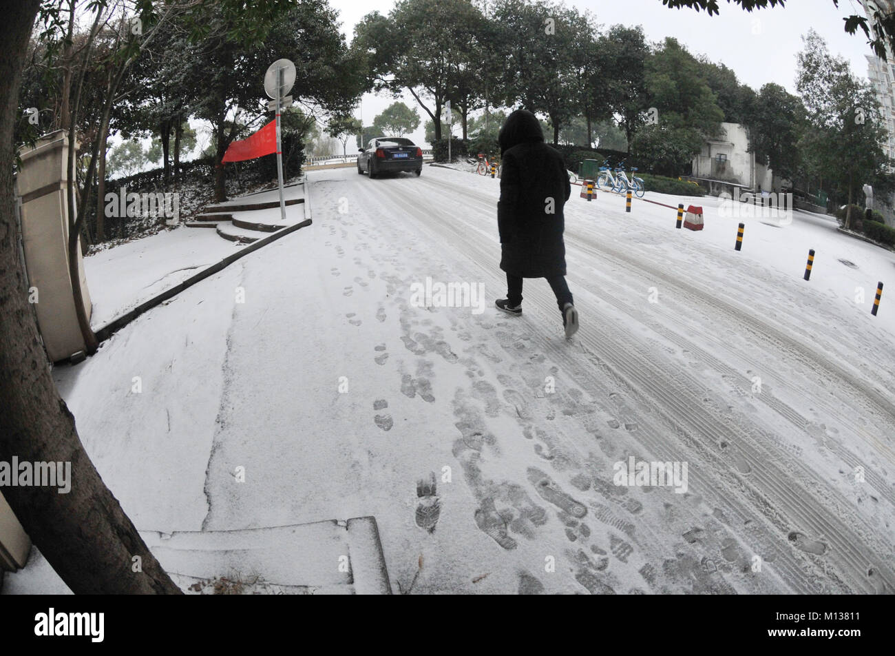 Changsha, China's Hunan Province. 26th Jan, 2018. Citizens walk on a ...