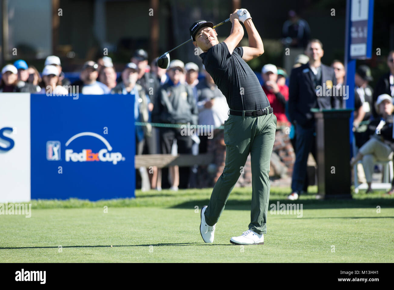San Diego, USA. 25th Jan, 2018. Xinjun Zhang on 1st hole during opening ...