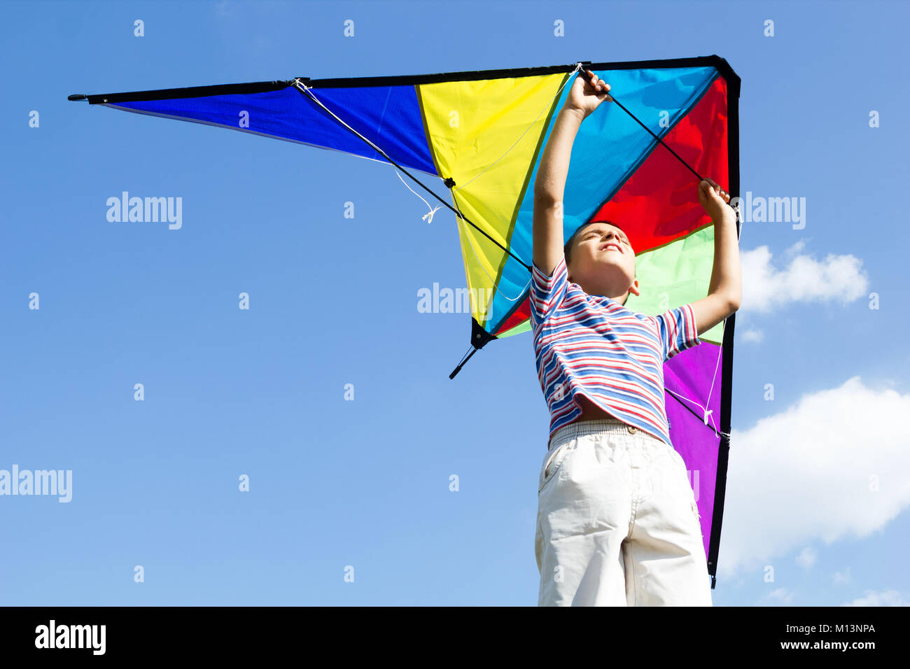 happy kid playing with kite Stock Photo - Alamy