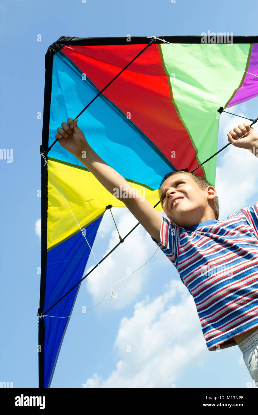 happy kid playing with kite Stock Photo - Alamy