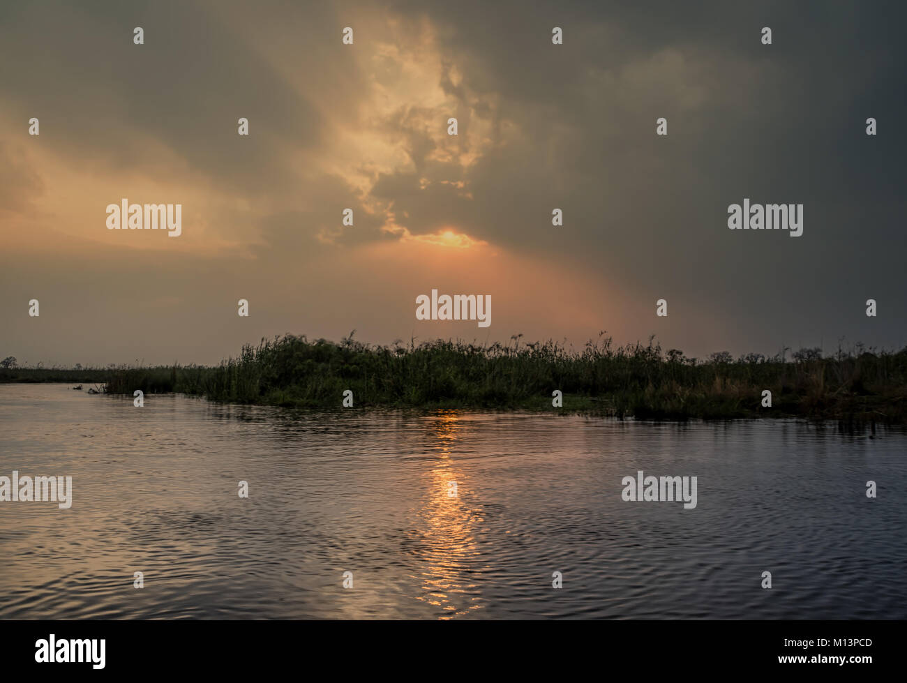 Sunset over a river in the Caprivi Strip, Namibia Stock Photo - Alamy