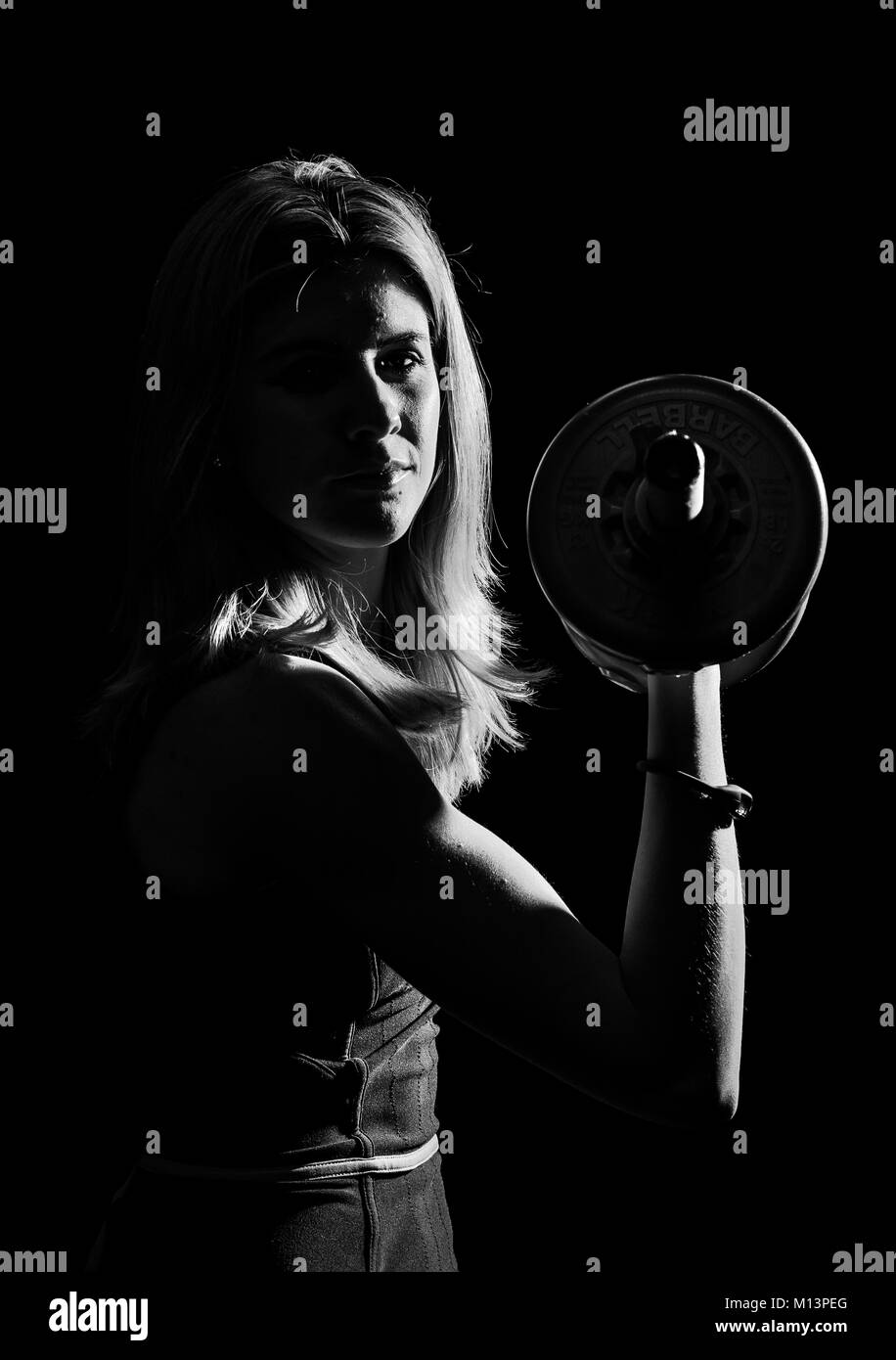 Arm lifting weight Black and White Stock Photos & Images - Alamy