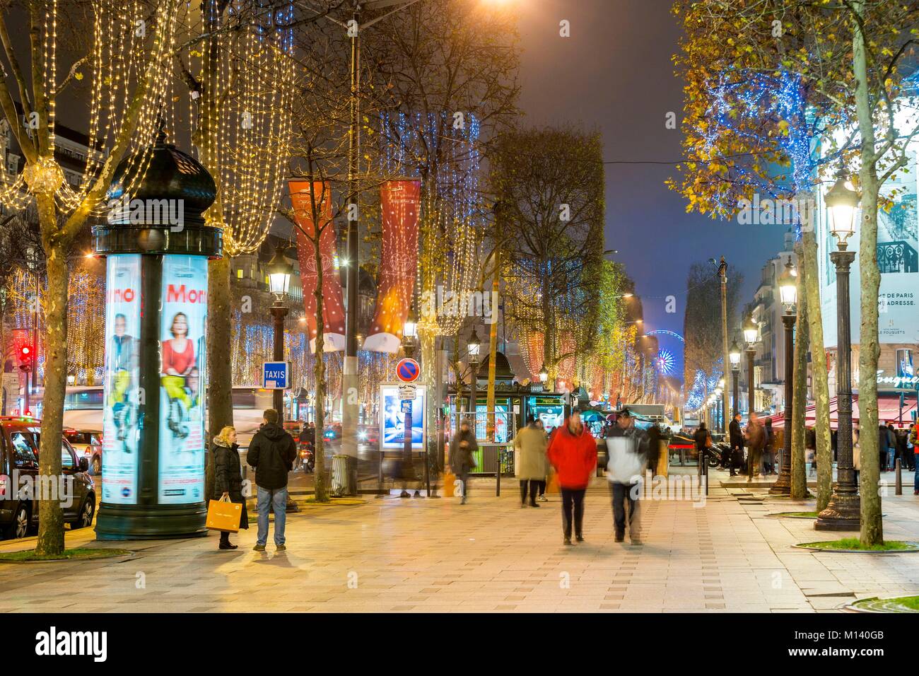 France, Paris, the Champs Elysees and Christmas holiday illuminations ...