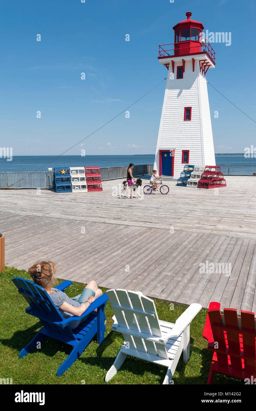 Canada, New Brunswick, Shippagan, lighthouse and lobster pots in the ...